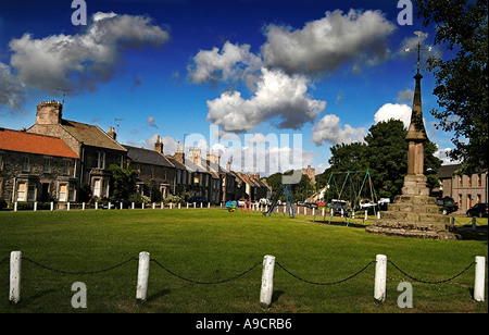 Norham village green, looking towards the Castle Stock Photo - Alamy
