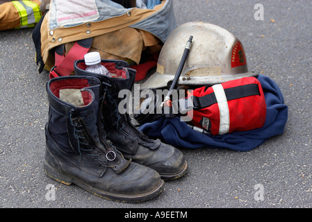 protective firefighter uniform. fire helmet, protective pants, protective jacket and gloves ...
