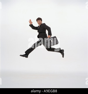Japanese businessmen jumping Stock Photo: 71109429 - Alamy