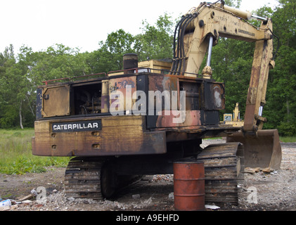 Old JCB digger abandoned in woods Stock Photo - Alamy
