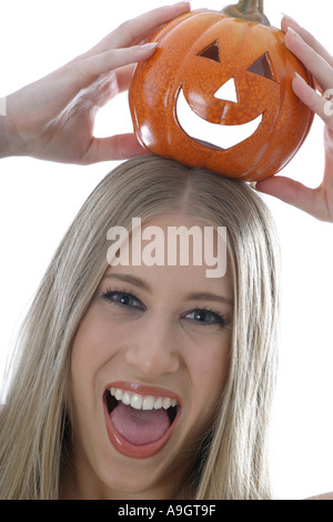 A vertical shot of a person with a pumpkin head Stock Photo - Alamy