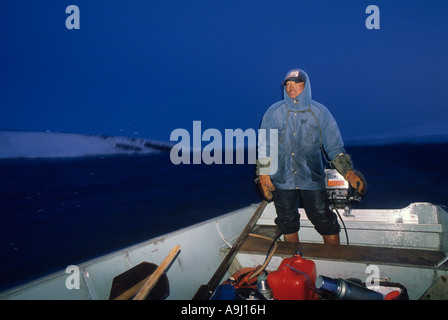 USA Alaska Yupik Eskimo Simeon John prepares harpoon on spring hunting ...