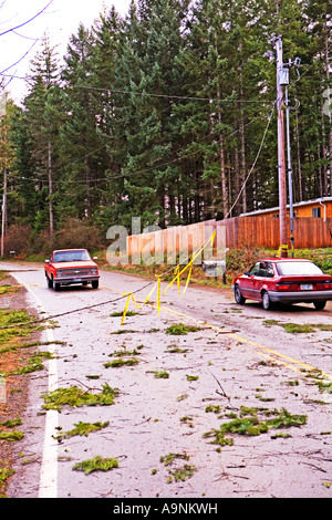 Image of a car and a truck driving opposite directions taking turns ...