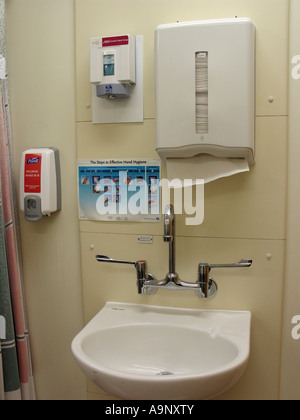 hand washing station on hospital ward with antiseptic gel dispenser ...