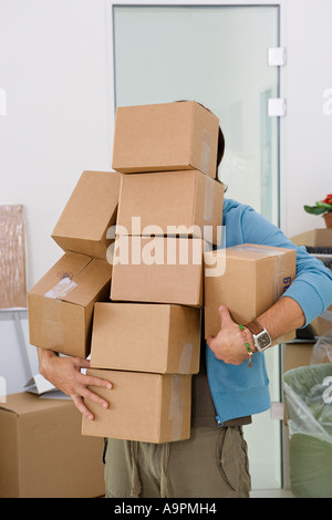 Interior of modern office with cardboard boxes, furniture and monitor ...