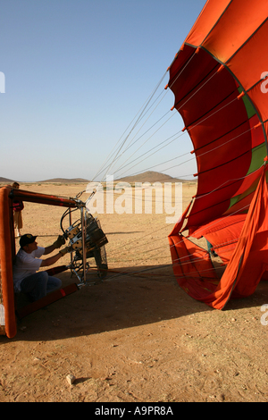 Filling a hot air balloon side view Stock Photo - Alamy