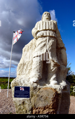 RNLI flag over liveboat man statue at the National Memorial Arboretum ...