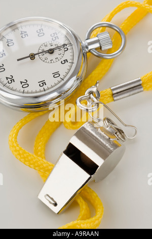 Coach, whistle and sport training with stopwatch, exercise and time ...