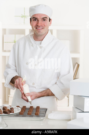 portrait of european male baker in bakery Stock Photo - Alamy
