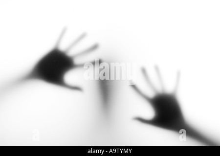 Hands and face behind an opaque surface Stock Photo - Alamy