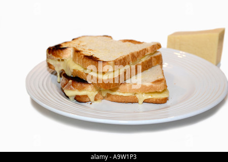 Toasted Cheddar Cheese sandwich with the liquified cheese oozing out ...