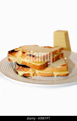 Toasted Cheddar Cheese sandwich with the liquified cheese oozing out ...