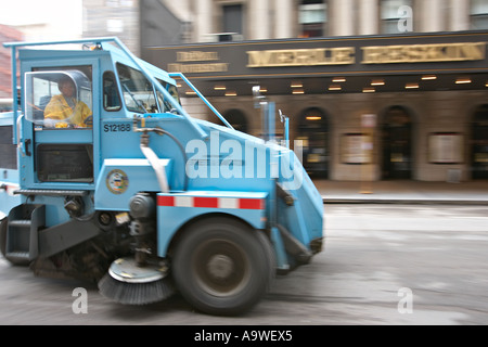 USA Illinois Chicago Sanitation workers empty solar powered trash Stock ...