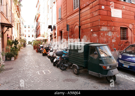 Three wheel mini van in Rome Italy Stock Photo - Alamy
