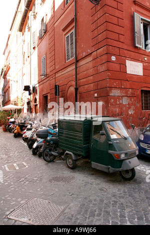 Three wheel mini van in Rome Italy Stock Photo - Alamy