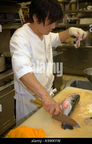 Preparing a Fugu blowfish for sashimi in a Japanese restaurant Stock ...
