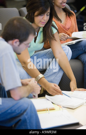 Students comparing notes Stock Photo - Alamy
