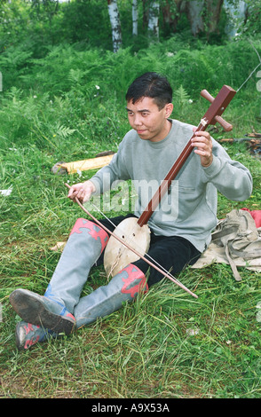 Portrait of an Altaian man. El-Oiyn - national festival of Altaic ...