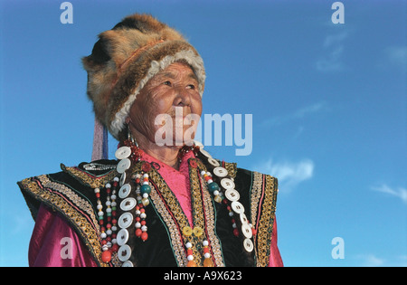 Portrait of an old woman in Altaic costume National Altaian cultural ...