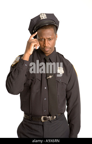 A confused african american police officer on a white background ...