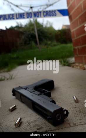 Gun on the floor , crime scene Stock Photo - Alamy