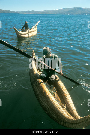Fisherman floating on traditional reed raft. Different types of rafts ...