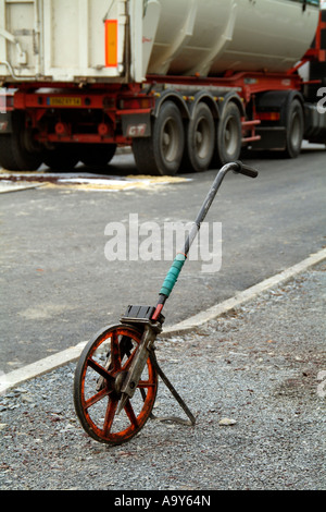 Road measuring wheel Stock Photo - Alamy