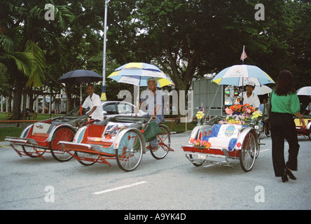 AUSTRALIAN TOURISTS ENJOYING A TRISHAW RIDE GEORGETOWN PENANG MALAYSIA ...