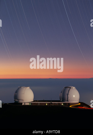 Observatory telescopes with star trails. Time-exposure image with a ...