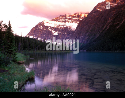 Mt. Edith Cavell reflected in Cavell Lake at sunrise, Jasper National ...