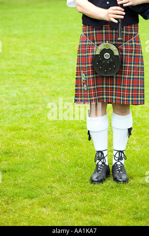 Scottish piper with tartan kilt sporran busby bagpipes at the opening ...