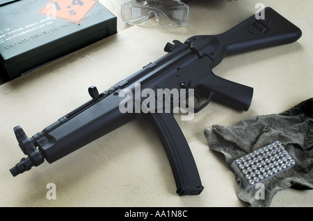 a police heckler and koch mp5 assault rifle and a special forces mp5 ...