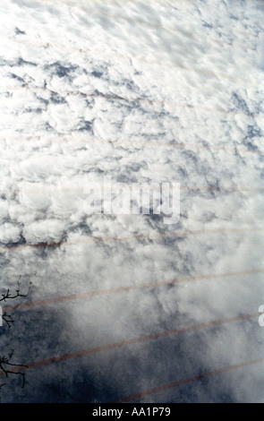 Clouds reflected in a car window Stock Photo - Alamy