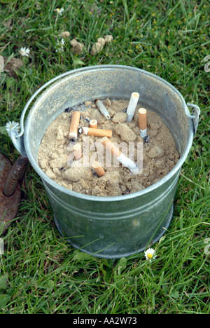 cigarette stubs in a sand bucket Stock Photo - Alamy