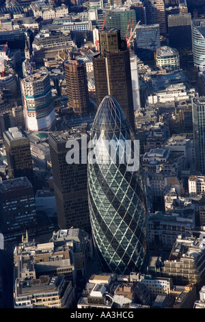 Aerial close up view of The Gherkin and the Willis Buildings which ...