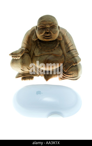 Buddha genie facing designer mouse concept Stock Photo - Alamy