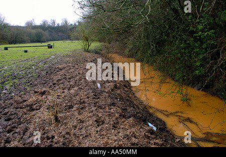 Discolored stream running out of Brofiscin Quarry, toxic waste was ...