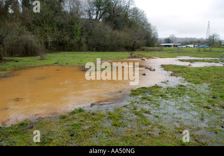 Discolored water at Brofiscin Quarry, toxic waste was dumped here in ...