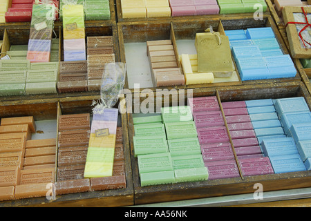 Colorful soaps on a market stall with baskets Stock Photo - Alamy