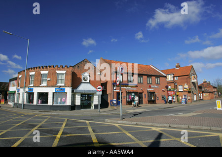 Center of Wroxham village on the Norfolk Broads with cars on the ...