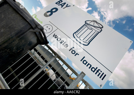 Angled shot of a "waste for landfill" sign at a waste and recycling ...