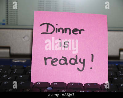 Memo note on notebook, dinner is ready Stock Photo - Alamy