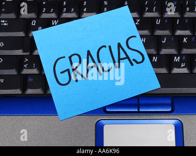 memo note on notebook, gracias, thanks Stock Photo - Alamy