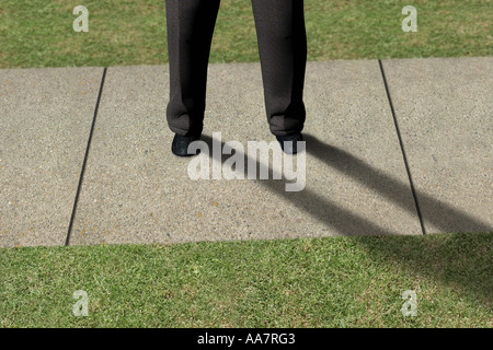 Feet stuck in concrete Stock Photo - Alamy