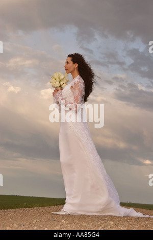 Lovely bride background by fluffy cumulus clouds in scenic Saskatchewan ...