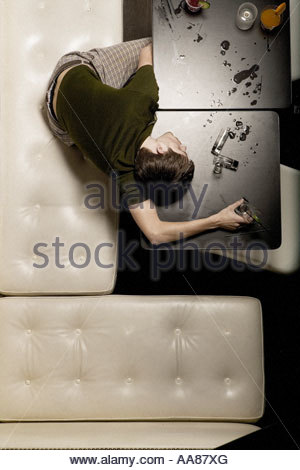 Drunk young man passed out in bar Stock Photo: 20134222 - Alamy