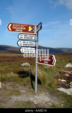 Directional tourist information sign with names of monuments and ...