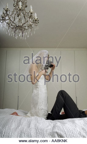 Wedding, bride and groom, bridegroom, kneel, hand bouquet, kiss Stock ...