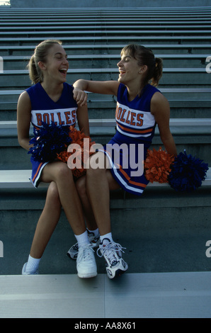 Cheerleaders on bleachers Stock Photo - Alamy