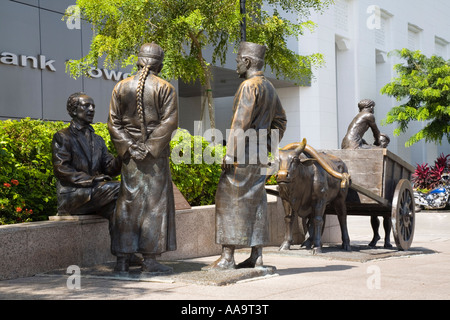 Bronze statues of The River Merchants on the River Sing in Singapore ...